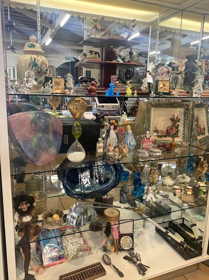Behind glass, these figurines patiently wait for their second act. That blue dish has definitely seen some fancy dinner parties in its day.