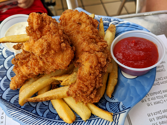 Golden-battered fish and chips that crackle with each bite, a reminder that sometimes the simplest dishes require the most skill.