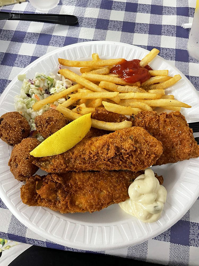 Fish so perfectly fried it makes you wonder if the chef has a PhD in crispology. The golden ratio of crunch to flake that dreams are made of.