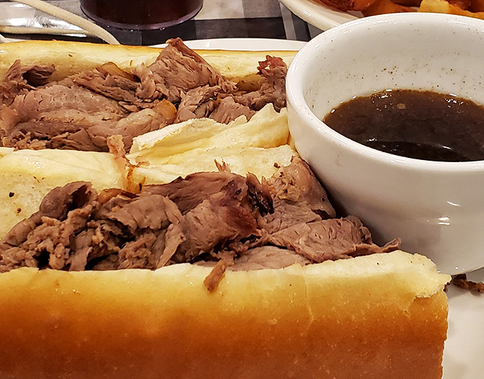 The French Dip sandwich—where thinly sliced beef meets its soulmate: a warm roll and that magical au jus for dunking.