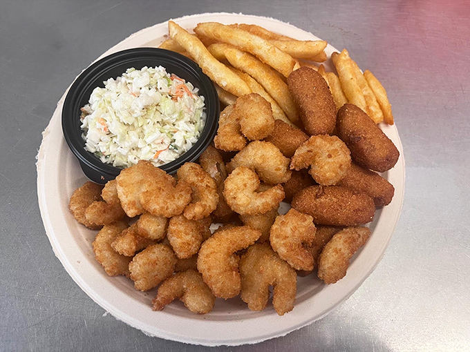 Crispy little crescents of joy! These fried shrimp huddle next to fresh coleslaw and fries like the world's most delicious beach party.