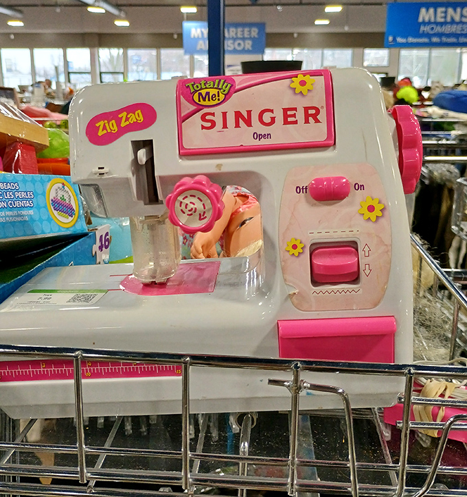A child's first sewing machine, pink as bubblegum, waiting to inspire the next Project Runway winner for less than a fancy coffee.