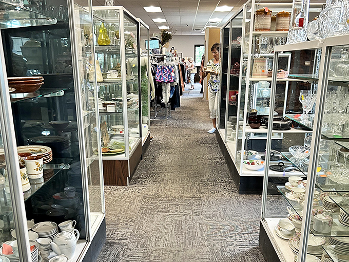 Crystal and china displayed with museum-like precision. Grandma's formal dining room meets modern bargain hunting between these glass cases.