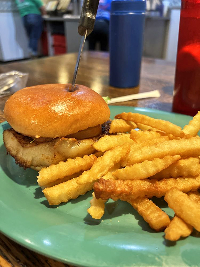 The grouper sandwich &ndash; Florida's unofficial state treasure &ndash; sits proudly on its throne of a fresh bun, ready to convert even the most committed burger loyalists.