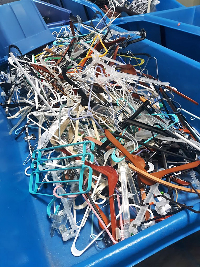 Hanger mountain: where closet organization dreams go to be reborn. The plastic rainbow offers endless possibilities for just pennies.