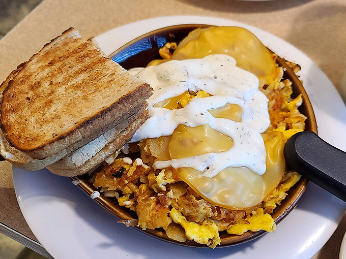 The breakfast skillet that launched a thousand food dreams&mdash;home fries mingling with eggs and cheese in a symphony of morning deliciousness.