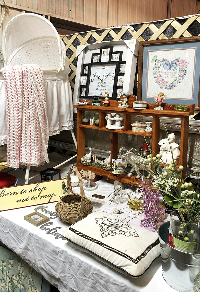 "Born to shop, not to mop" says it all! This charming display of home d&eacute;cor would make even minimalists reconsider their life choices.