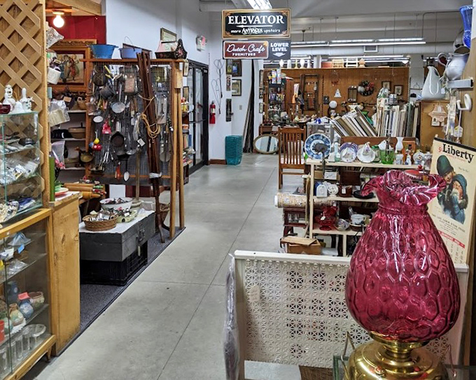 Follow the "Elevator" sign to discover even more floors of vintage wonders. That cranberry glass lamp would look perfect in your reading nook.