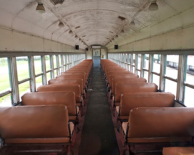 Vintage coach seating arranged in neat rows offers a glimpse into mid-century train travel&mdash;comfortable enough for the journey, yet authentically nostalgic.