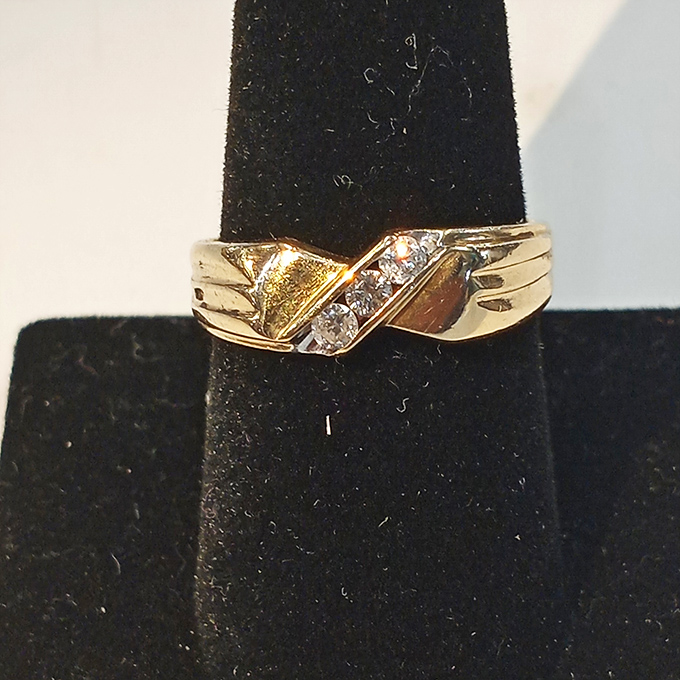 Diamonds and gold glimmer under careful lighting, tempting you to add a bit of sparkle to your everyday ensemble. 