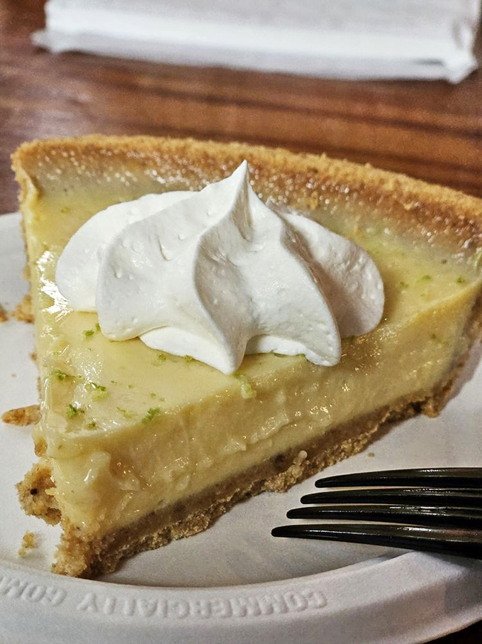 Key lime pie that strikes the perfect balance between tart and sweet, with a dollop of whipped cream that melts into the silky filling.