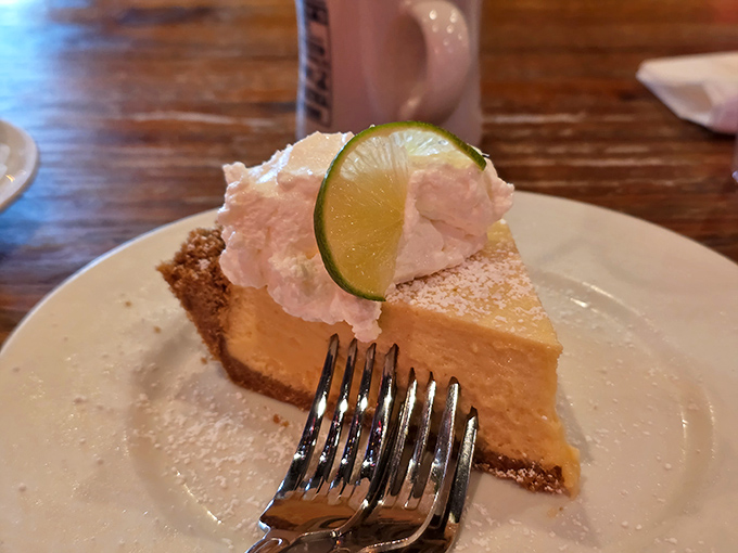 This key lime pie doesn't mess around—the perfect balance of tart and sweet topped with a dollop of whipped cream and a lime slice crown.