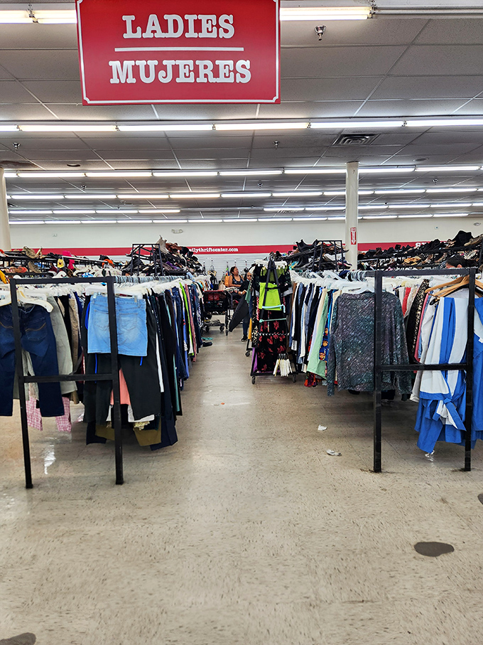 Under the bilingual "Ladies/Mujeres" sign, fashion democracy reigns supreme&mdash;where designer labels and everyday brands share the same real estate without attitude.