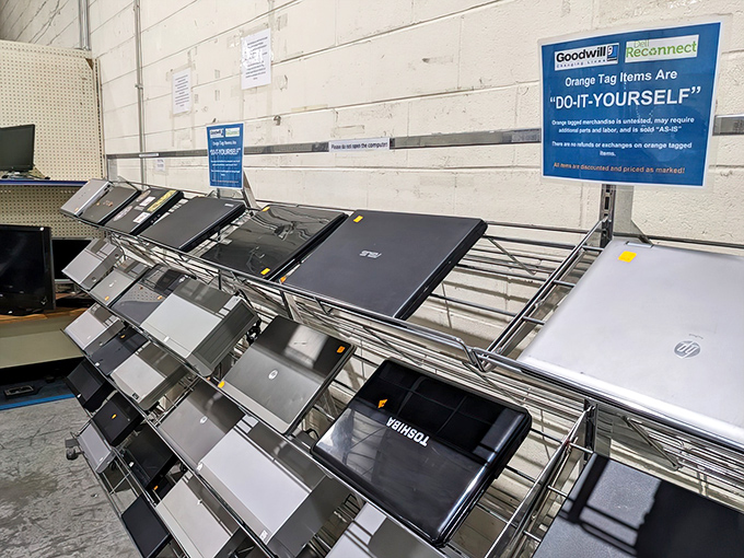 Laptop row &ndash; where yesterday's technology gets a tomorrow, with orange "DIY" tags indicating these digital devices are ready for their comeback story.