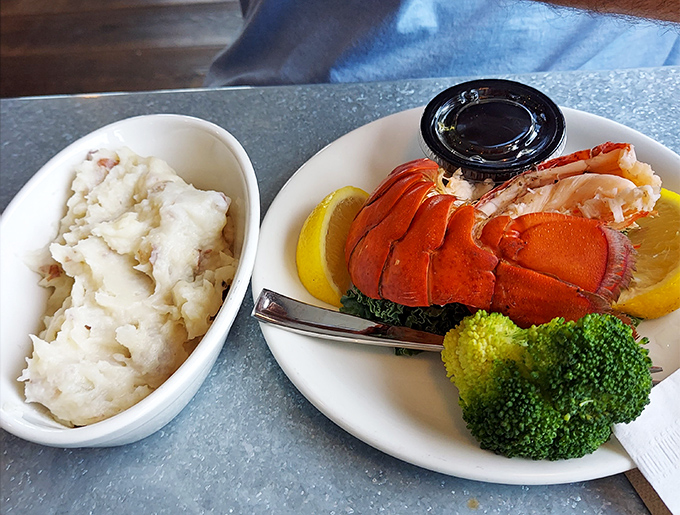 Lobster tail: nature's way of saying "you deserve something special today." Paired with cloud-like mashed potatoes for a match made in seafood heaven.