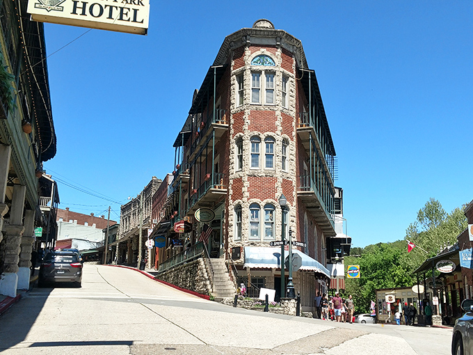 The Basin Park Hotel anchors downtown with its distinctive flatiron design, proving that corners were merely optional in Victorian architecture.