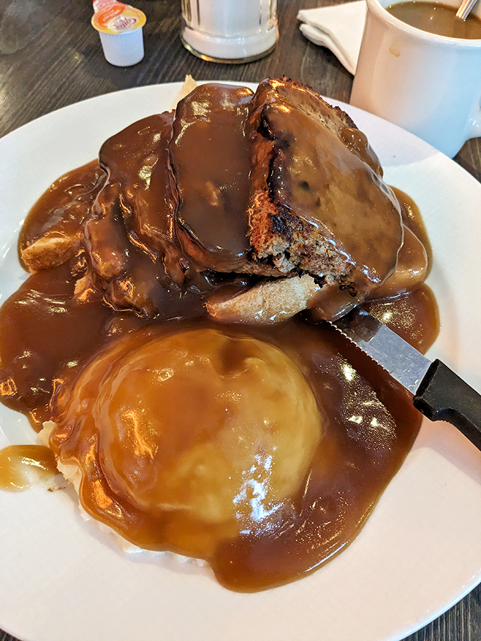 Meatloaf and mashed potatoes swimming in gravy lake &ndash; comfort food so nostalgic it might actually trigger childhood memories you never had.