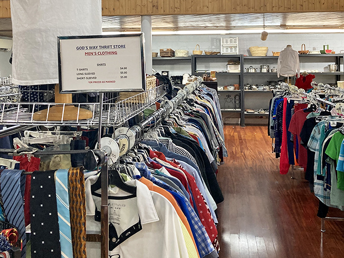 The men's clothing section offers everything from casual tees to dress shirts, organized with a precision that would make Marie Kondo proud.