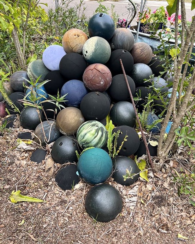 The bowling ball graveyard where strikes and spares come to retire. Each one probably has stories of perfect games and gutter balls.