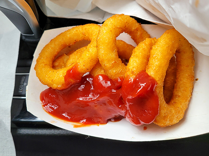 These onion rings aren't just side dishes&mdash;they're golden halos of happiness. Crispy, substantial, and demanding to be dunked in ketchup with reckless abandon.