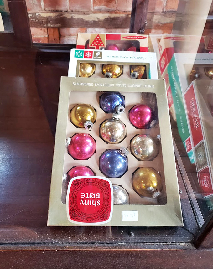 These Shiny Brite ornaments aren't just Christmas decorations; they're time capsules of holidays past, perfectly preserved in their original packaging.