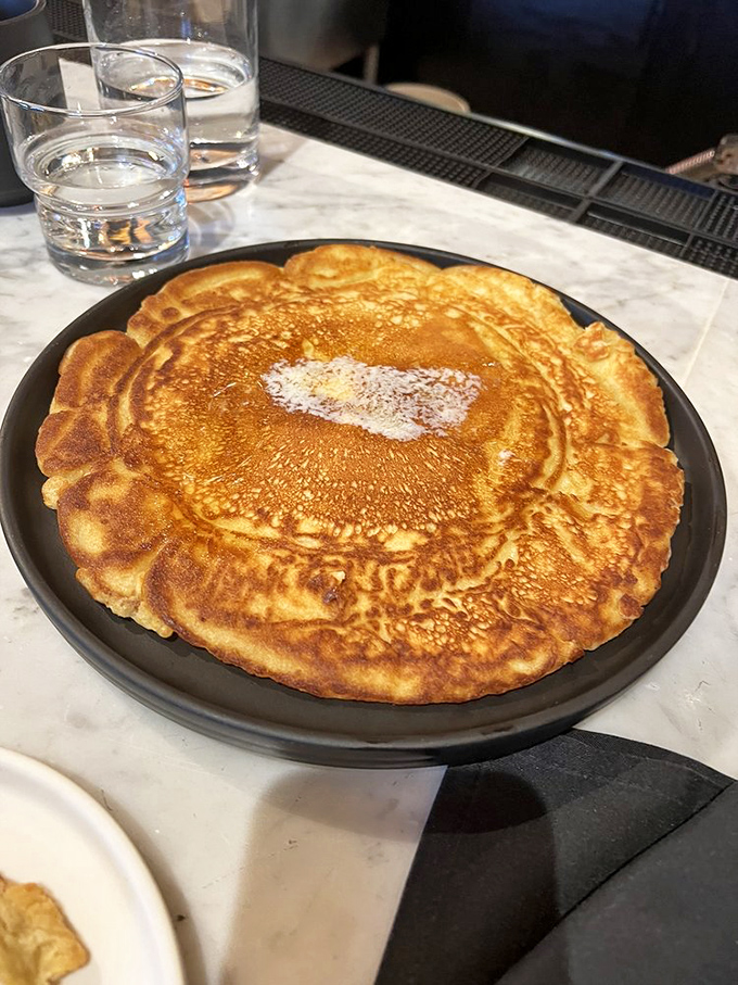 This pancake isn't just large&mdash;it's practically planetary, with a golden-brown surface that could make NASA jealous.