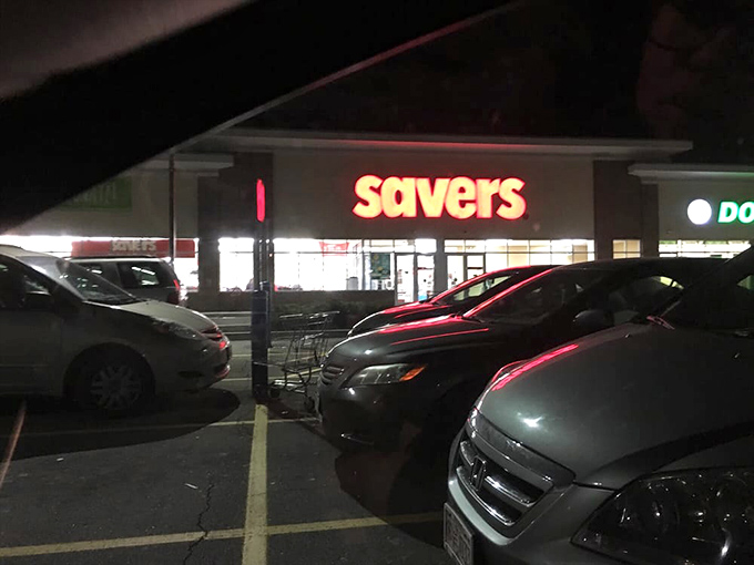 Even at night, that red sign glows like a beacon for night owls seeking last-minute bargains before closing time.
