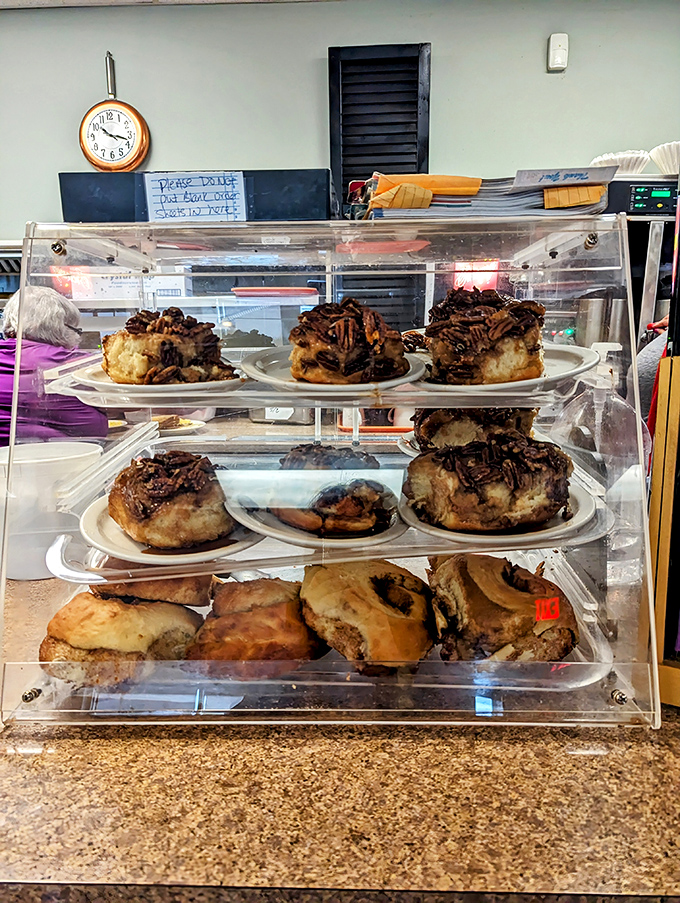 The pastry case: where cinnamon rolls and morning buns gather like delicious conspirators plotting against your willpower.