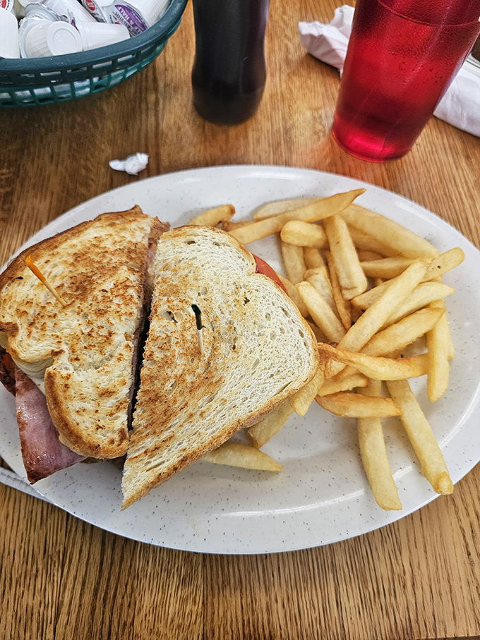 The humble sandwich elevated to art form. This grilled masterpiece proves that sometimes the simplest pleasures are the most profound.