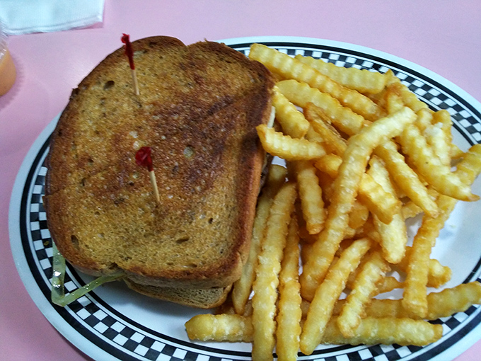 This isn't just a sandwich&mdash;it's a patty melt manifesto. Crispy bread, melty cheese, and a philosophy that says "life is too short for diet food."
