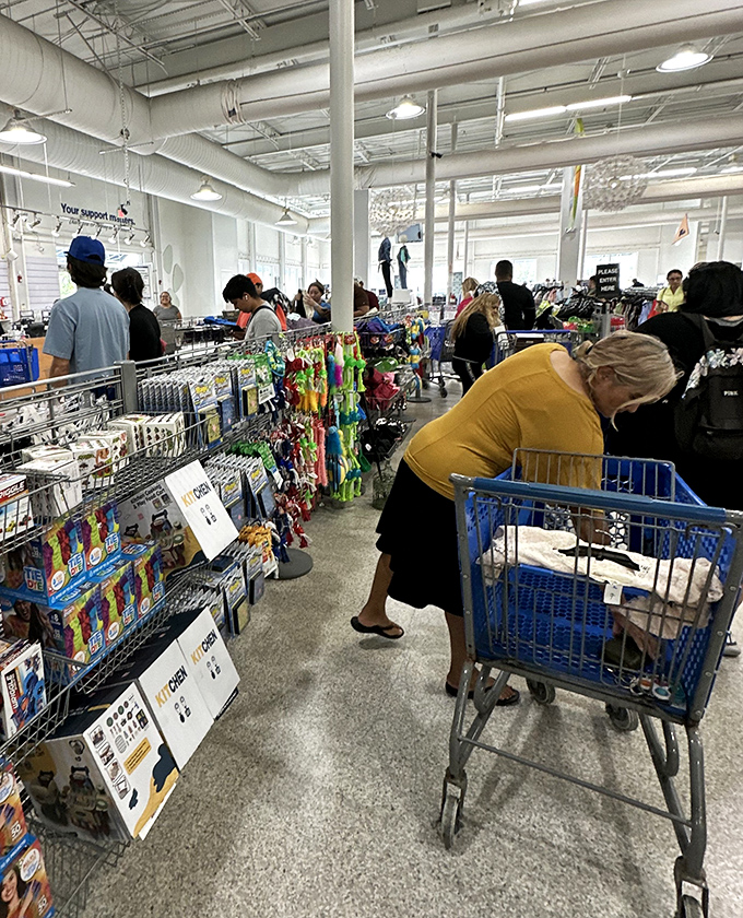 The thrill of the hunt in action. Each shopper scanning for that one perfect find among thousands of possibilities.