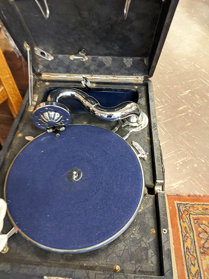 This vintage phonograph waits patiently to spin melodies that once made grandparents dance until dawn.