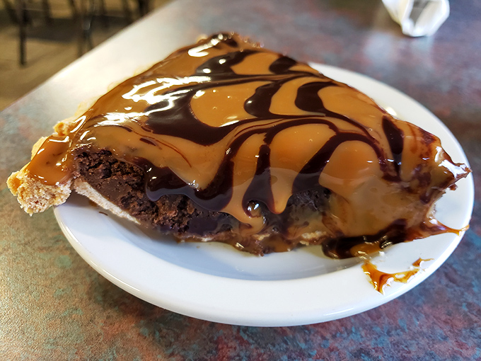 Caramel drizzled over chocolate pie creates a dessert so decadent it should require a permission slip. Diet plans, consider yourselves officially suspended.
