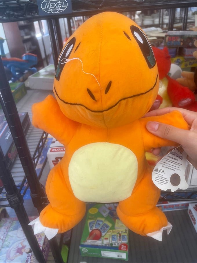 "Choose me!" says this Charmander plushie, proving even Pok&eacute;mon need second homes when their trainers outgrow their collecting phase.