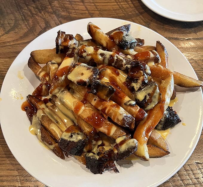 These aren't just cheese fries—they're a masterclass in indulgence, with pork belly adding that "I-shouldn't-but-I-must" factor.