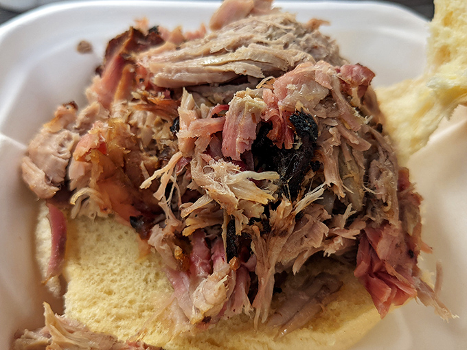 Tender pulled pork piled high on soft white bread &ndash; simplicity elevated to an art form that requires napkins by the dozen.