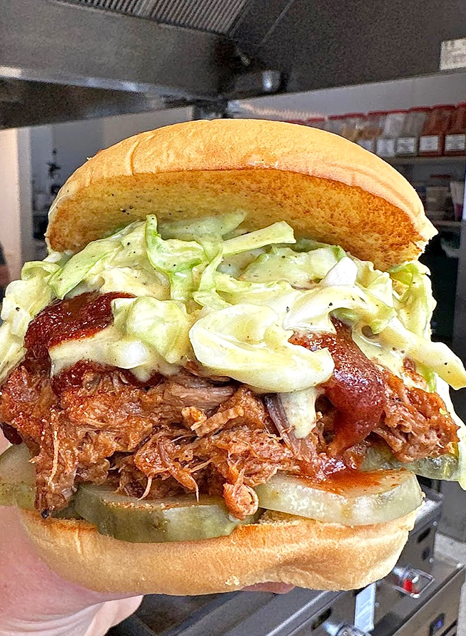 This pulled pork sandwich doesn't just have layers of flavor&mdash;it has chapters, subplots, and a surprise ending that involves napkins and happiness.