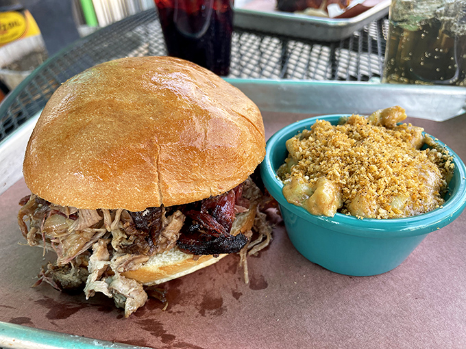 This isn't just a sandwich&mdash;it's an architectural marvel of pulled pork, perfectly balanced between soft bun and crunchy slaw.