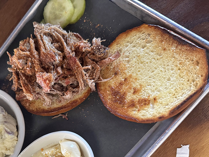 The open-faced pulled pork sandwich &ndash; where bread exists merely as a delivery system for smoky, spice-rubbed meat that's the real star.