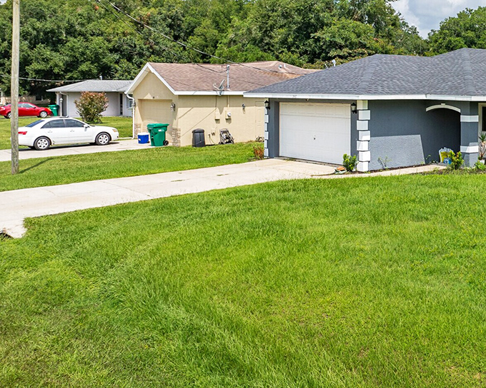 Modest homes with tidy lawns where your retirement check buys actual square footage instead of a glorified closet with a view.