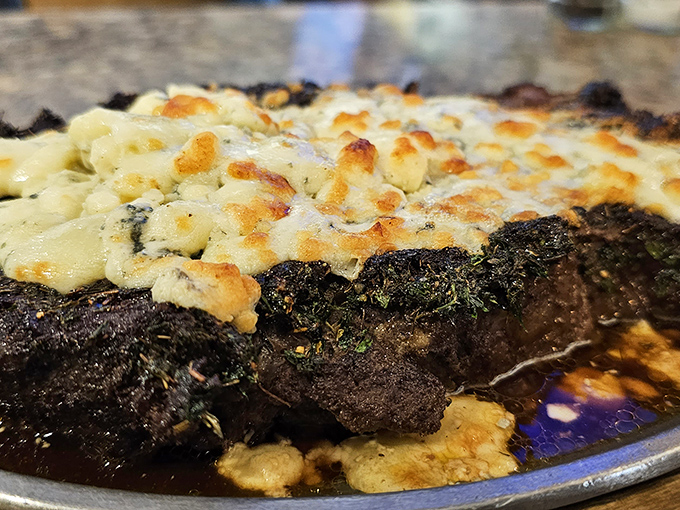 When a steak wears blue cheese like a crown, you know you're not in fast-food territory anymore. This is beef royalty.