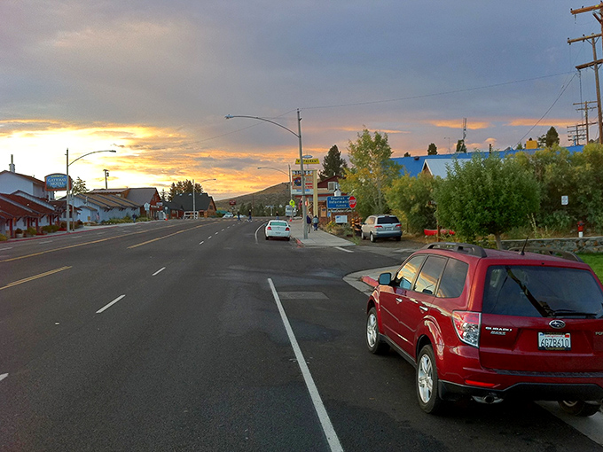 Sunset paints Lee Vining's main drag in cinematic hues &ndash; small town America with a blockbuster backdrop.