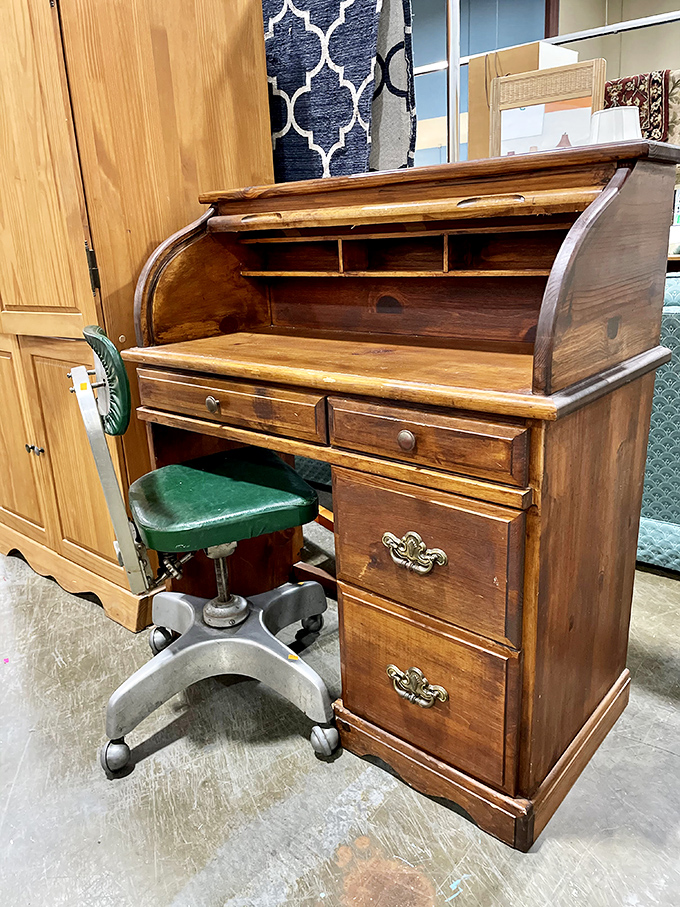 This roll-top desk has seen some history—and it's ready to witness yours. Paired with that vintage office chair, it's a work-from-home dream team.