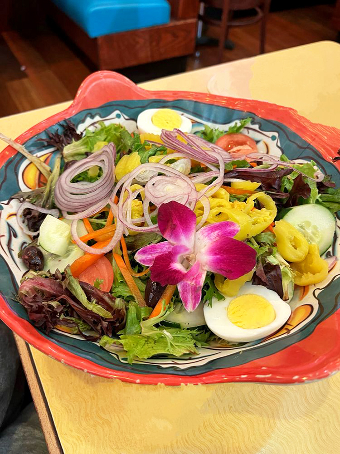 Even their salads come dressed to impress, complete with an orchid garnish. When a diner respects vegetables this much, you know you're somewhere special.