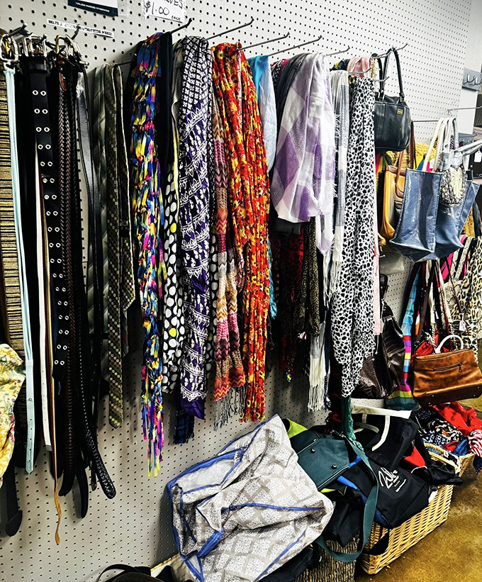 The accessory wall of fame! These colorful scarves and belts transform ordinary outfits into fashion statements faster than you can say "vintage chic."
