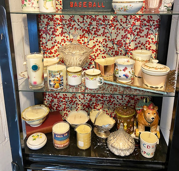 A shrine to candles that would make any Yankee Candle store blush with inadequacy. That vintage baseball sign adds the perfect nostalgic touch.