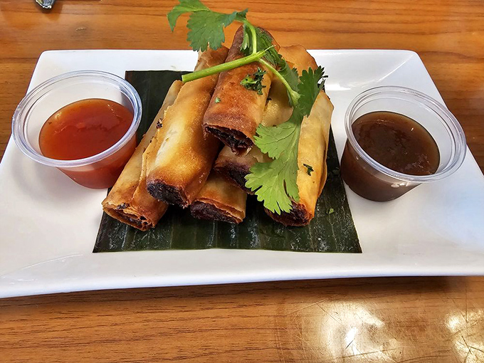 Shanghai egg rolls lined up like delicious little soldiers, ready to march straight into your heart. Two dipping sauces because life's too short for monogamy.