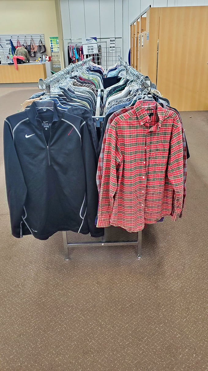 Nike pullovers and plaid shirts hanging together prove that athletic and lumberjack styles can peacefully coexist.