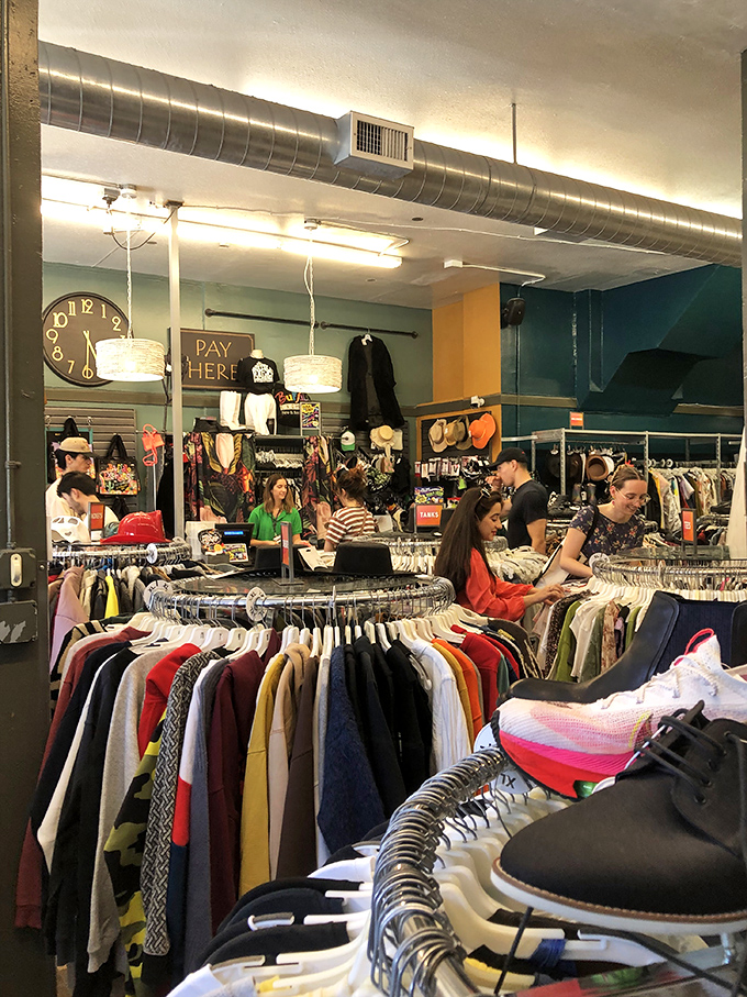 The dressing room line becomes an impromptu fashion show where strangers offer honest opinions worth more than any department store mirror.