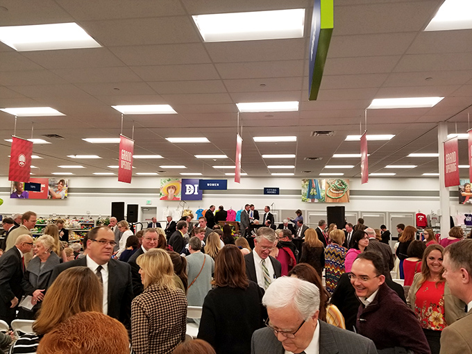 The grand opening crowd proves that thrift shopping isn't just a hobby, it's a community event where treasure hunters gather like prospectors during a gold rush.